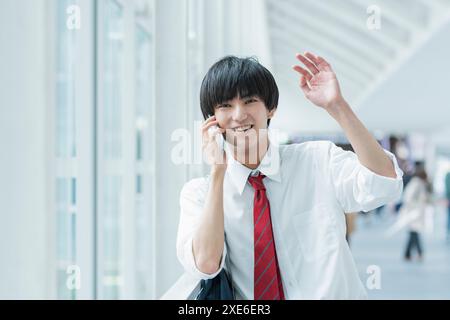 Japanese student on her way to school in Tokyo Japan Stock Photo - Alamy