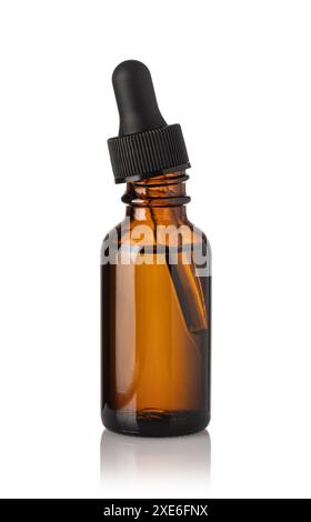 A drop of cosmetic oil falls from the pipette Stock Photo - Alamy
