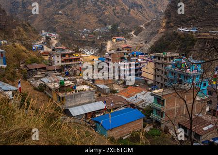 View over the roof tops of the Himalayan village of Syapru Besi on ...
