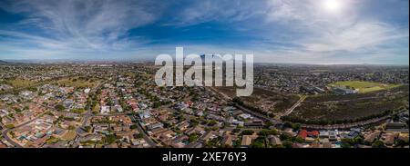 Aerial view of residential suburbs with one storey houses located near ...