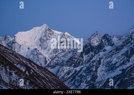 Snowy summit of Gangchempo Lang Tang Valley Trek, Himalayas, Nepal ...