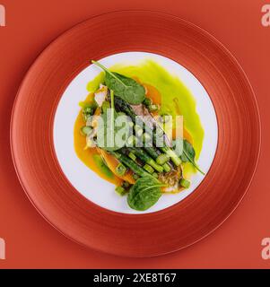 Fish dish - fried halibut fillet with sauce and java basket clams ...