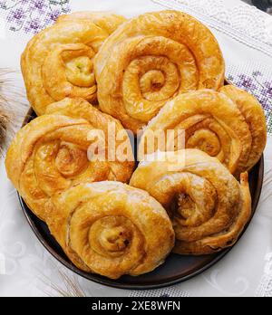 Tasty raising buns on a cloth background Stock Photo - Alamy