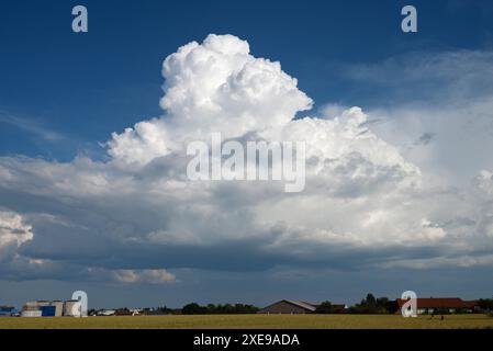 Towering cumulus thunderstorm clouds over the city Stock Photo - Alamy