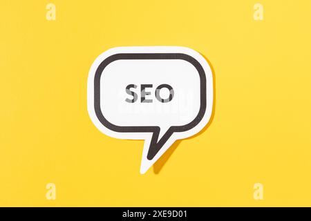 The word seo on yellow background. Top view. Flat lay Stock Photo - Alamy