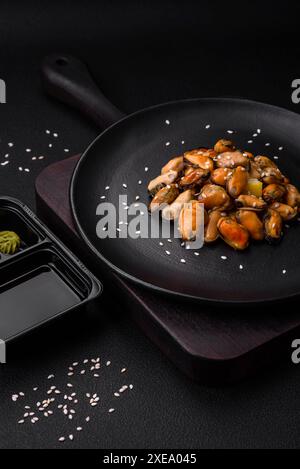 Pickled mussels with spices in the bowl Stock Photo - Alamy