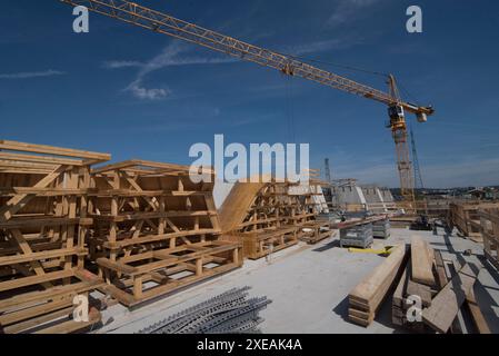 Construction crane in building industry, heavy machine at construction ...