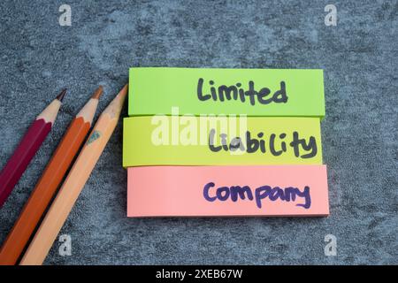 Limited Liability Company on the sticky notes with bokeh background ...