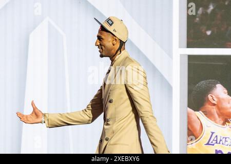Washington Wizards center Alex Sarr (20) blocks a shot by Boston ...