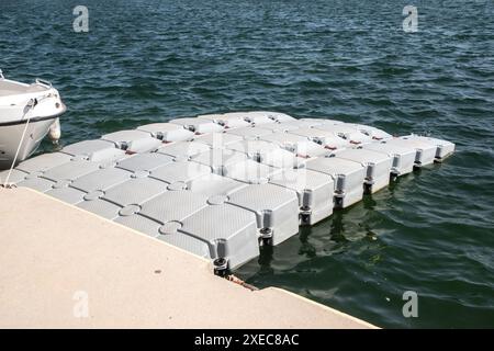 Plastic Modular Floating Dry Dock for Boats closeup on sunny day Stock ...