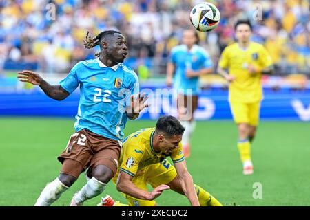 Jeremy Doku (22) of Belgium and Oleksandr Tymchyk (24) of Ukraine ...