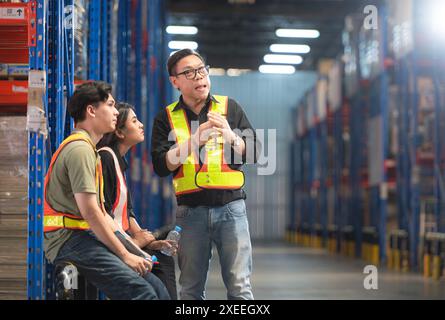 Group of warehouse employee rest comfortably during work Stock Photo ...