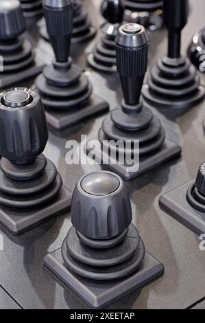 Close-up at controlling lever switch of crane truck vehicle, using to ...