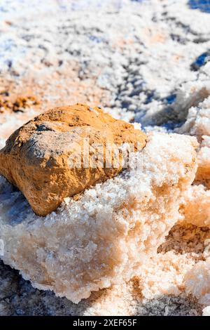 Dead Sea. Evaporated salt forms bizarre patterns on the water. Sunny ...