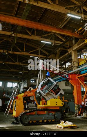 Vertical shot of a crawler bulldozer in a field Stock Photo - Alamy