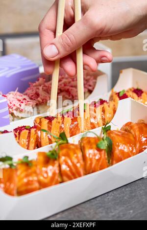 California Roll sushi with smoked eel, cucumber, avocado. Sushi menu ...