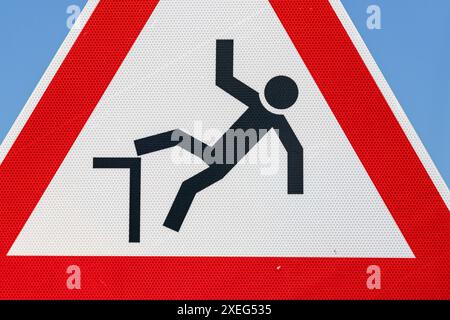 Traffic sign Caution cliffs danger of falling Stock Photo - Alamy