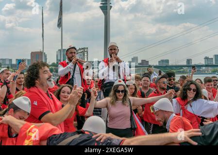 Albanian football fans celebrate with traditional music at the Old Town ...