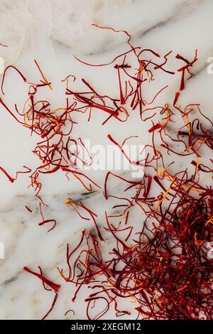 Red saffron (crocus sativus) stigmas - luxurious spice in table ...