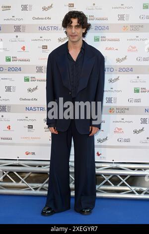 Alessandro Fella attends the blu carpet of premiere of HBO tv series ...