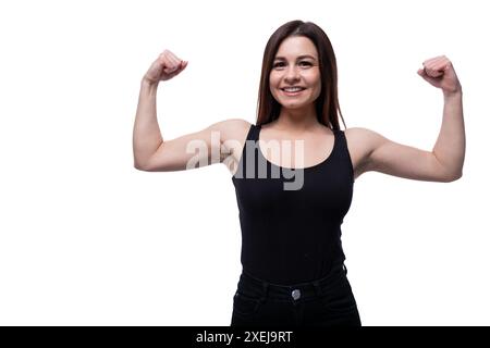 Caucasian young woman cutely showing strength and confidence Stock ...
