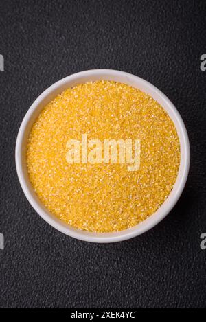 Corn grains or particles are yellow in color when raw Stock Photo - Alamy