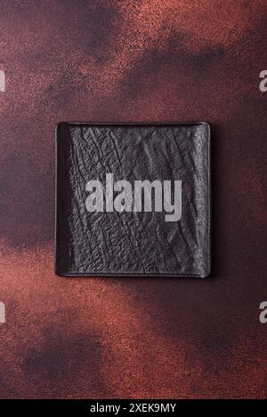 Black empty square plate Stock Photo - Alamy