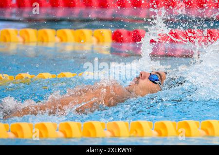 Thomas Ceccon of Italy competes in the 100m Backstroke Men Heats during ...