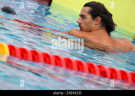 Thomas Ceccon of Italy competing in the 100m. Backstroke Men Final ...