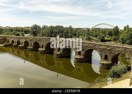 The ancient Roman bridge in Merida, Spain, spans the Guadiana River ...