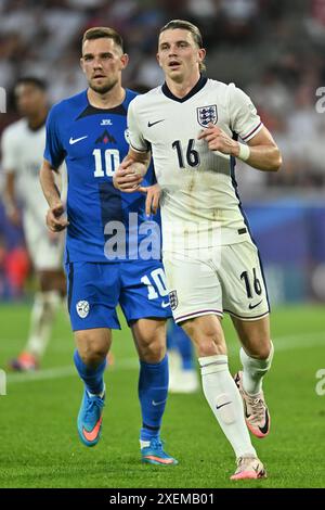 COLOGNE, GERMANY - JUNE 25: Timi Elsnik of Slovenia, Phil Foden of ...