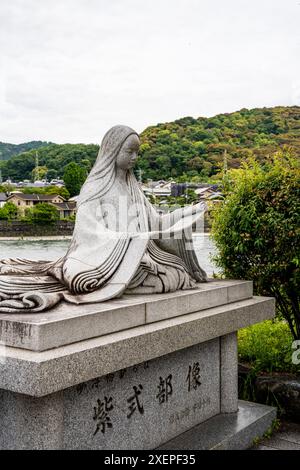 Statue of Japanese female writer Murasaki Shikibu, who lived in Heian ...