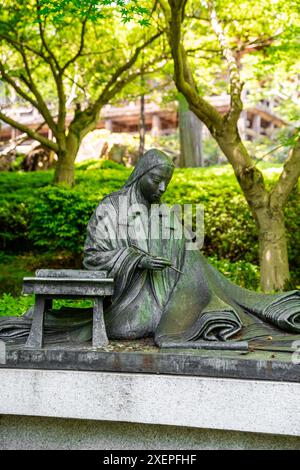 Statue of Japanese female writer Murasaki Shikibu, who lived in Heian ...