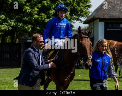 King Of Conquest ridden by jockey William Buick winning the JCB Fred ...