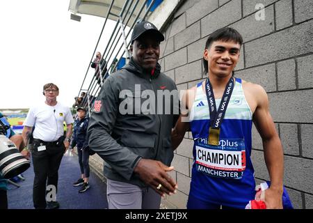 Carl Lewis after Louie Hinchliffe wins the Men's 100m final during day ...