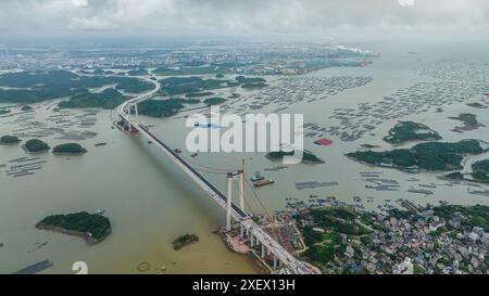 FANGCHENGGANG, CHINA - JUNE 29, 2024 - Longmen Bridge, the longest ...