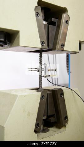 Tensile and elongation of corrugated steel bars, Research on building ...