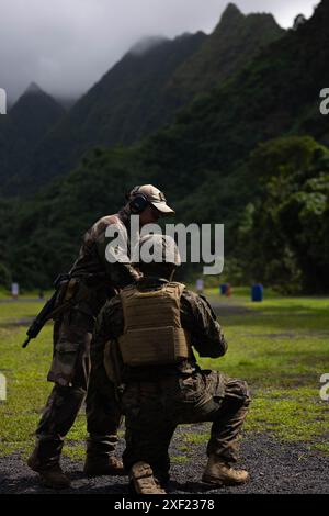 A Marine with Combined Joint Task Force (CJTF) and his Australian ...