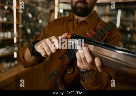 Man loading bullet into the rifle at legal commercial weapon store for ...