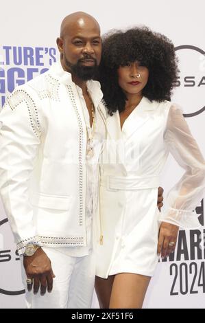 Ca. 30th June, 2024. Darrin Henson, Taurey Henson at arrivals for BET ...
