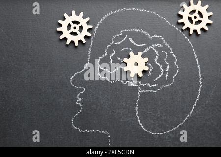 Amnesia problem. Drawing of head and brain on black background, top ...