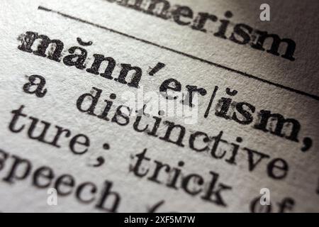 Word mannerism on dictionary page, macro close-up Stock Photo - Alamy