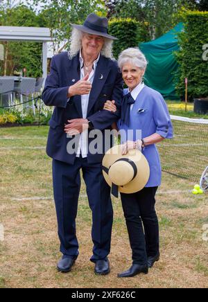 Anita Dobson and Sir Brian May attending the premiere of Cirque du ...