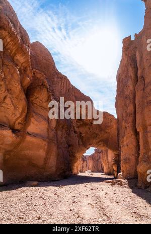 A desert landscape with natural geological formation stones and dry ...