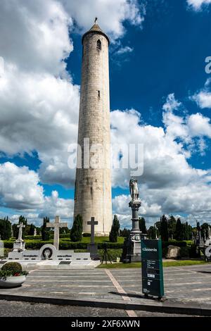 Tower over the tomb of Daniel O'Connell stands above gravesites and ...