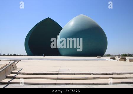 The Al-Shaheed Monument in Baghdad, Iraq, under a clear blue sky with ...