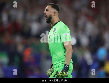 Georgia goalkeeper Giorgi Mamardashvili celebrates their side’s victory ...