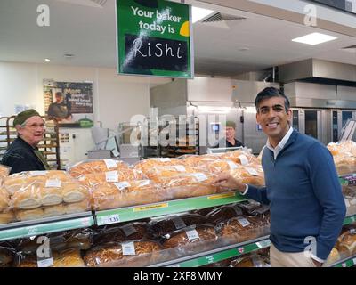 Prime Minister Rishi Sunak at a bakery during a visit to a Morrisons ...