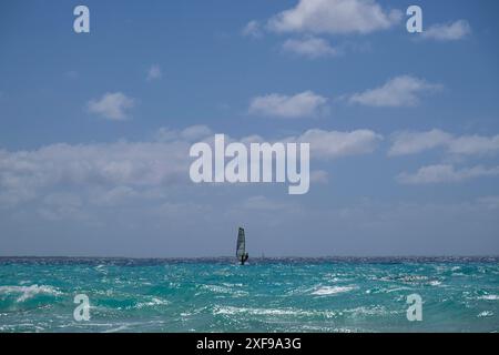Windsurfer in the Pacific, Tikehau, atoll, Tuamotu archipelago ...
