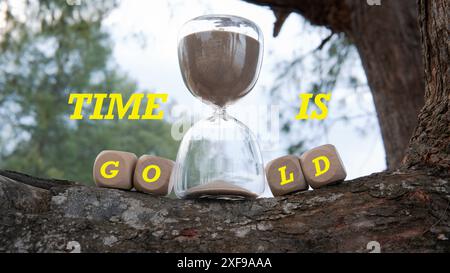 time concept with hourglass and sunrise at a beach. Time is gold quote ...